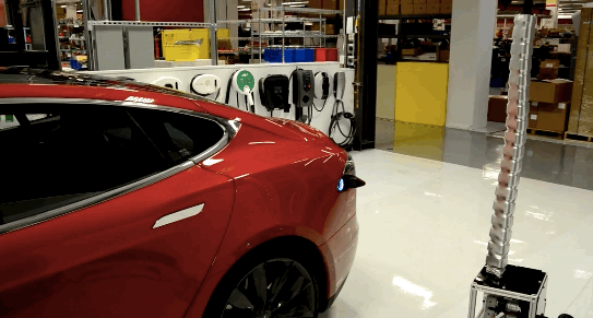 Tesla Unveiled A Seriously Creepy Robot Snake Charger That Plugs Itself ...